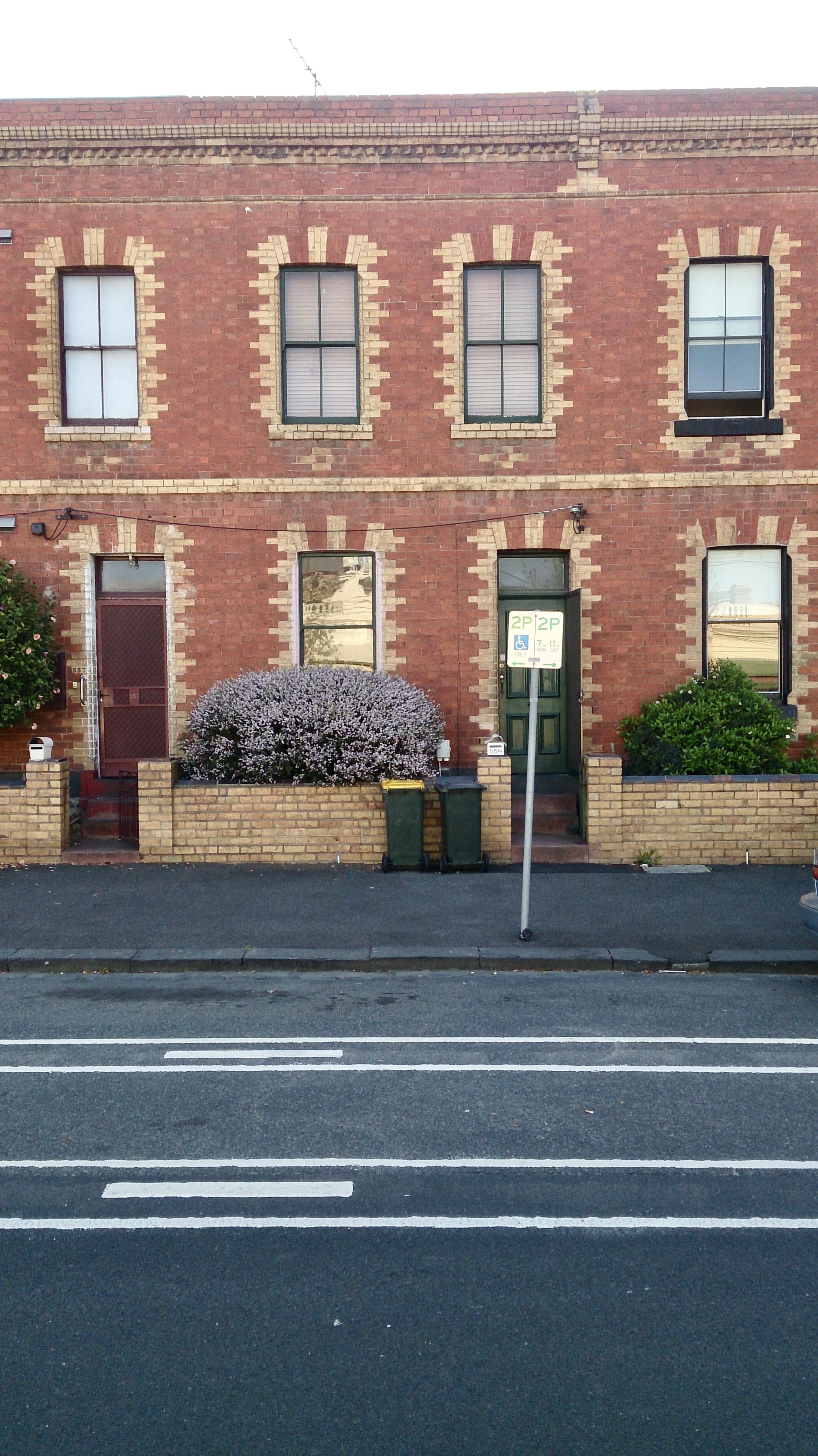 Pretty brick terrace, Carlton – Storey of Melbourne