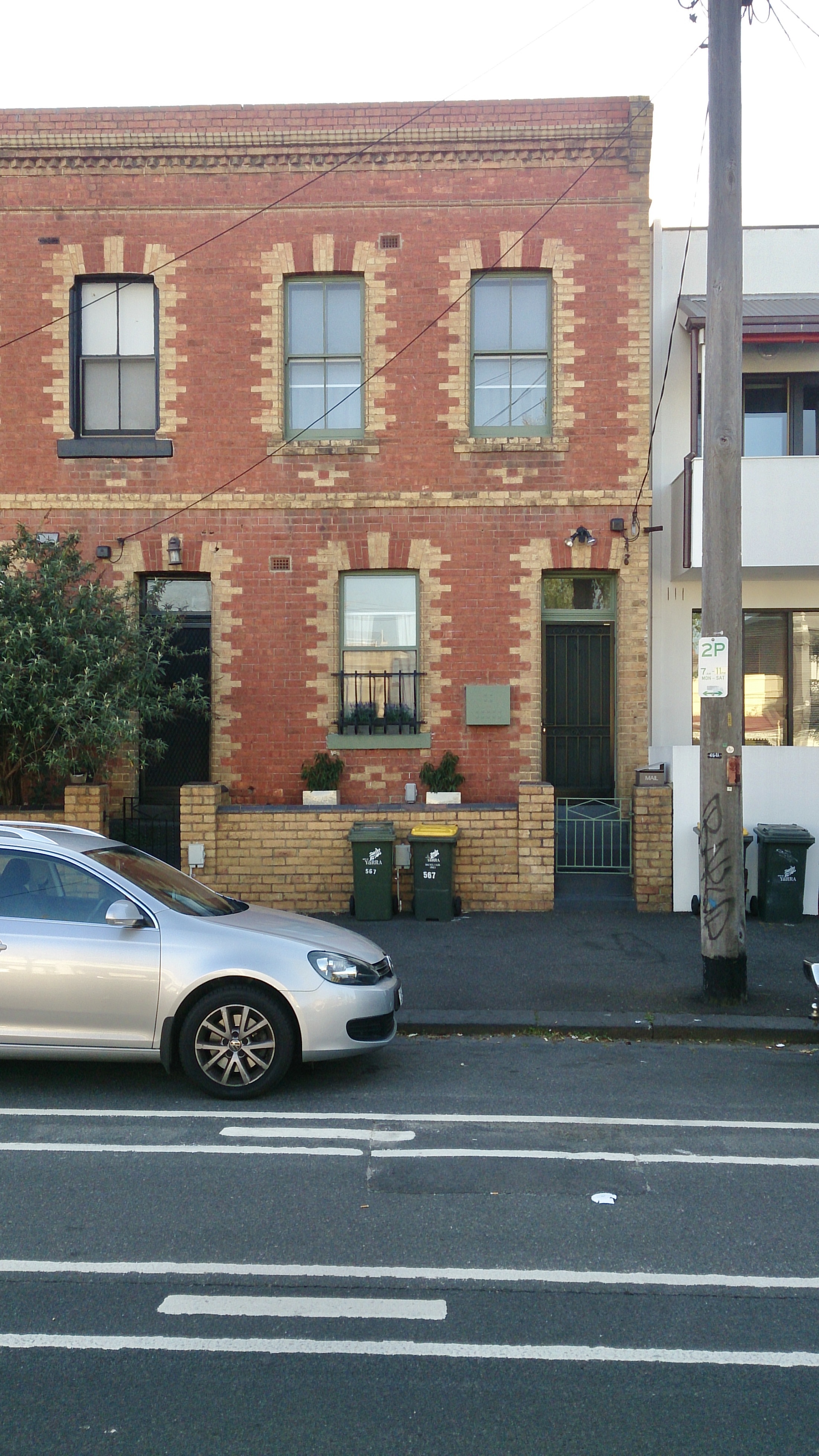 Pretty brick terrace, Carlton – Storey of Melbourne